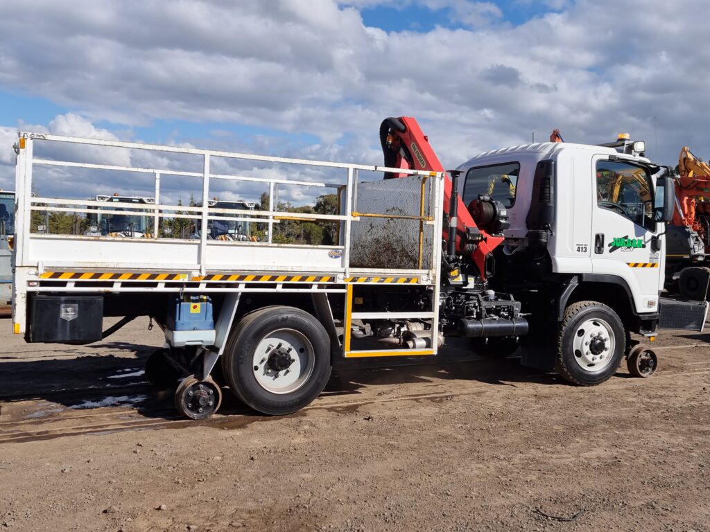 Hi-Rail Flatbed Crane Trucks - Jordan Rail